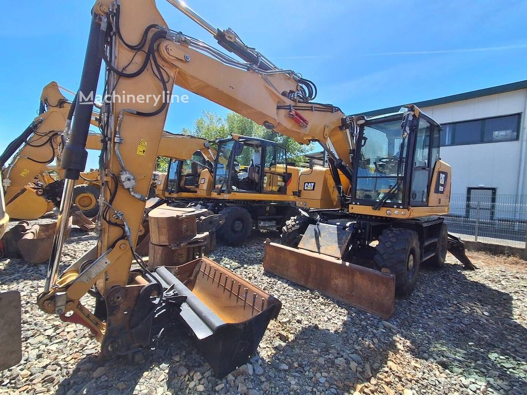 Caterpillar M315F bager točkaš