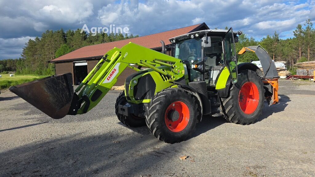 Prodaje se Claas NY PRIS – CLAAS Arion 640 – 2018 – kun 1 800 timer – frontlaster traktor točkaš na aukciji
