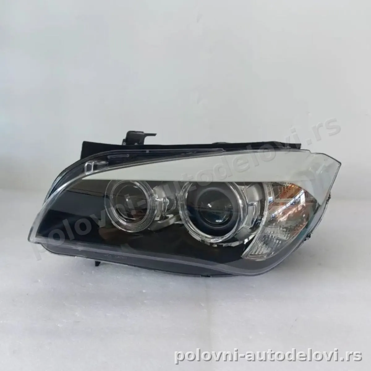BMW X1 E84 Bi-Xenon AHL far levi 63112993497