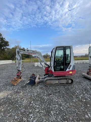 Mini bager
Takeuchi TB 228
