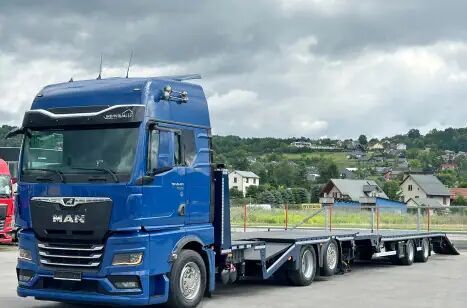 MAN TGX 26.470 šlep auto + prikolica za građevinske strojeve