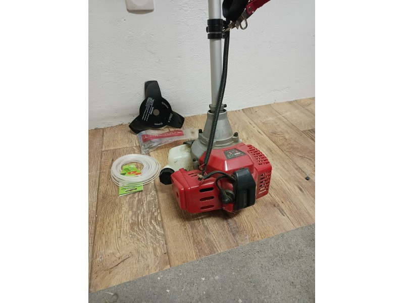 Benzinski trimer Womax garancija
