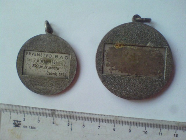 dve verzije medalje za sportske uspehe jna
